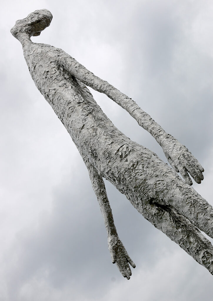 Giant “Looking Up” Humanoid Sculpture in Iowa. Sunday Morning ...